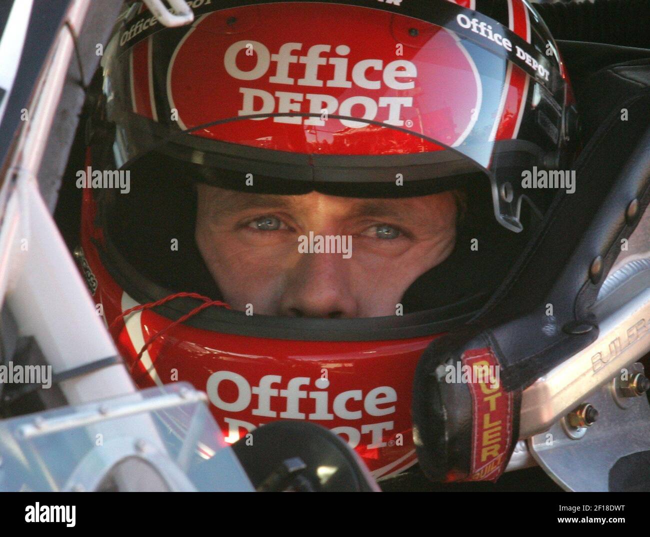Carl Edwards sits in his car during a competition caution of the ...