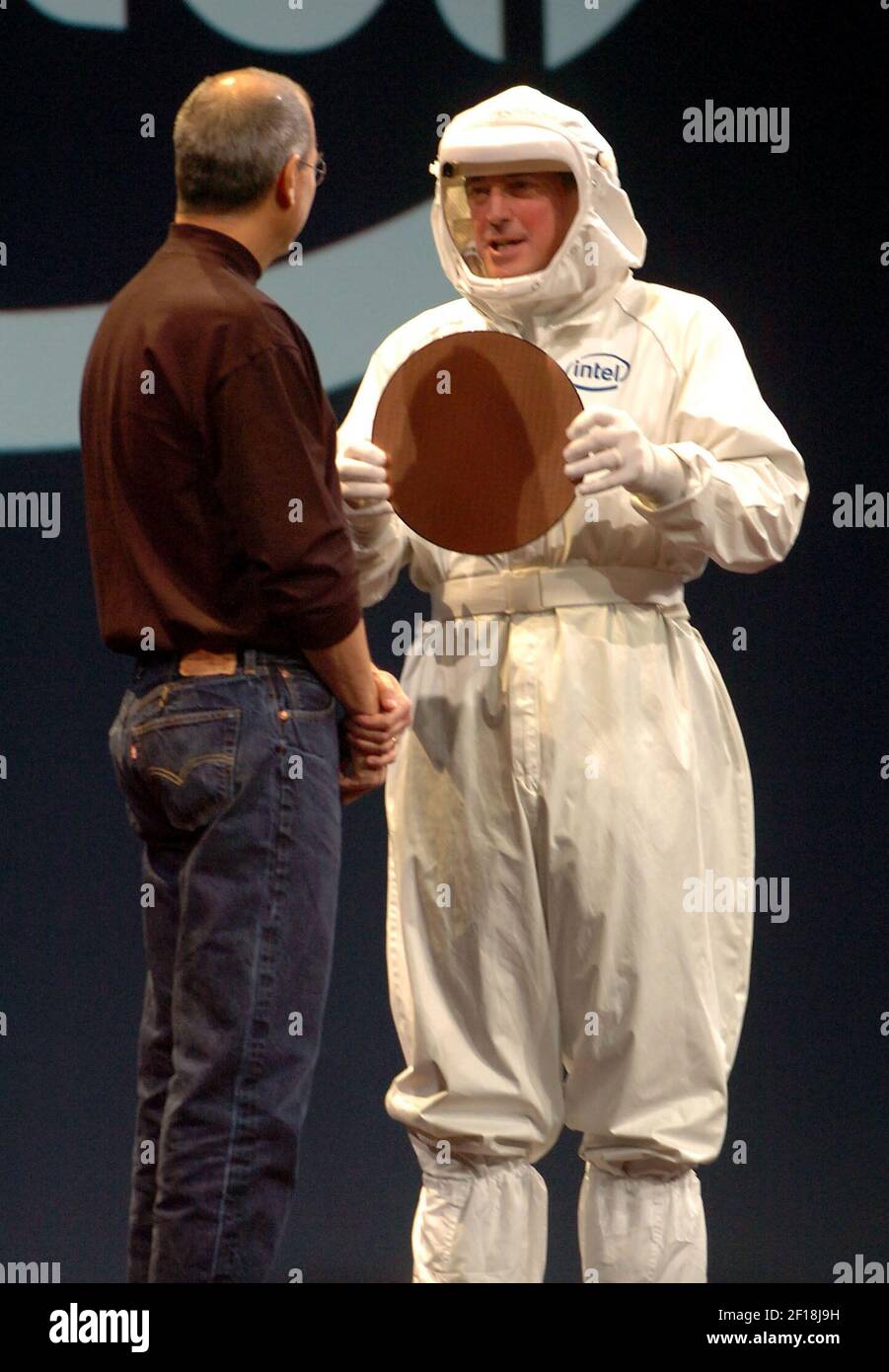 Paul Otellini, president of Intel, dons the clean suit to deliver to ...