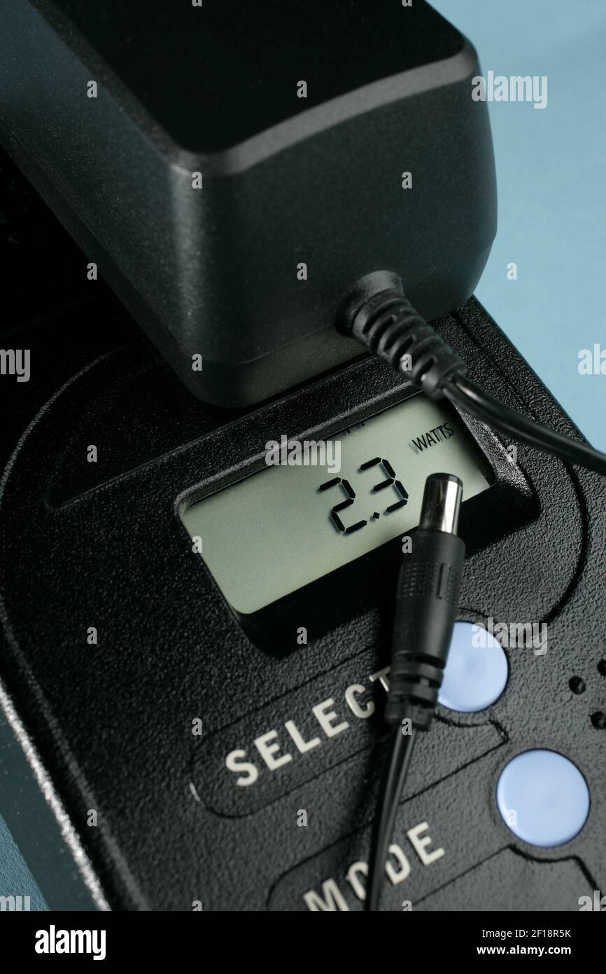 A wattage meter, shown here, displays how much electricity a charger ...