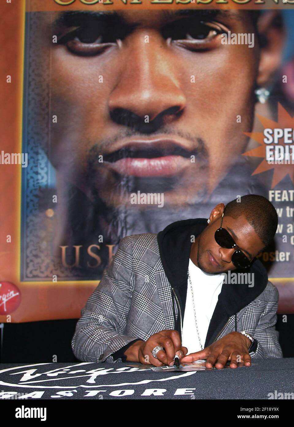 Usher makes an in store appearance at Virgin Megastore where he signed ...