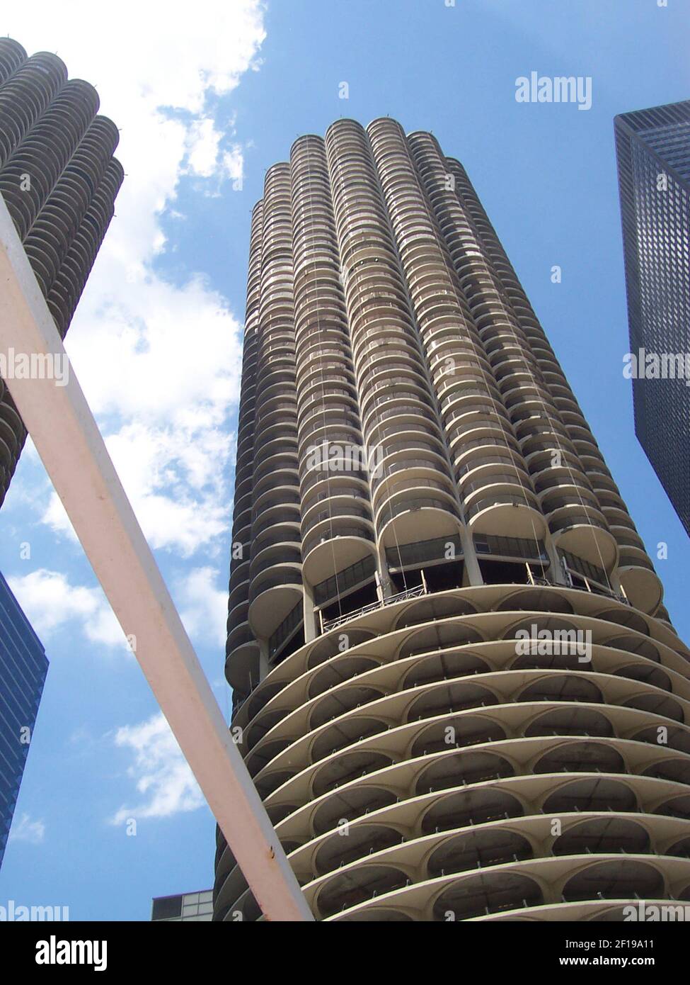 The distinctive Marina City Towers look like giant a corncob next to ...