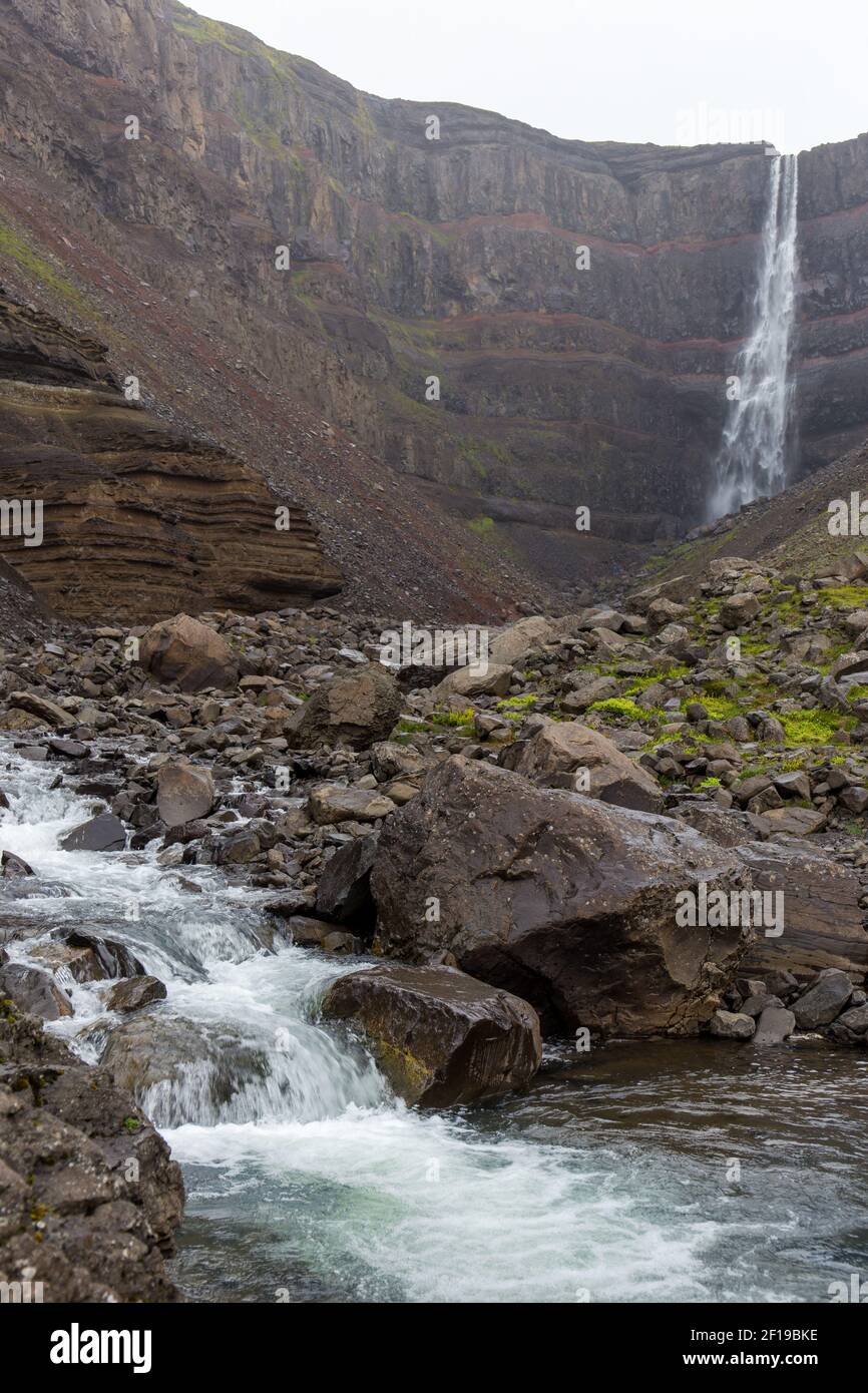 Basalt structures carved by filigree waterfall Stock Photo - Alamy