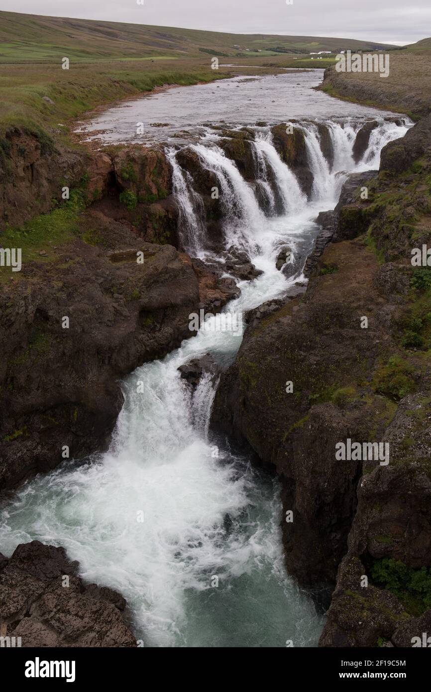quiet river turns into powerful waterfall Stock Photo - Alamy
