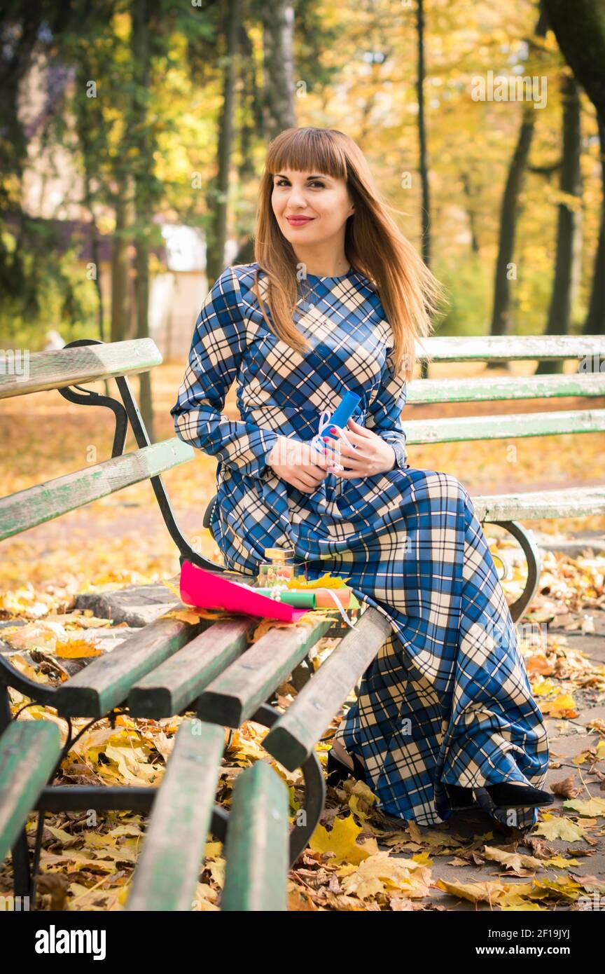 Beautiful girl in park autumn Stock Photo - Alamy
