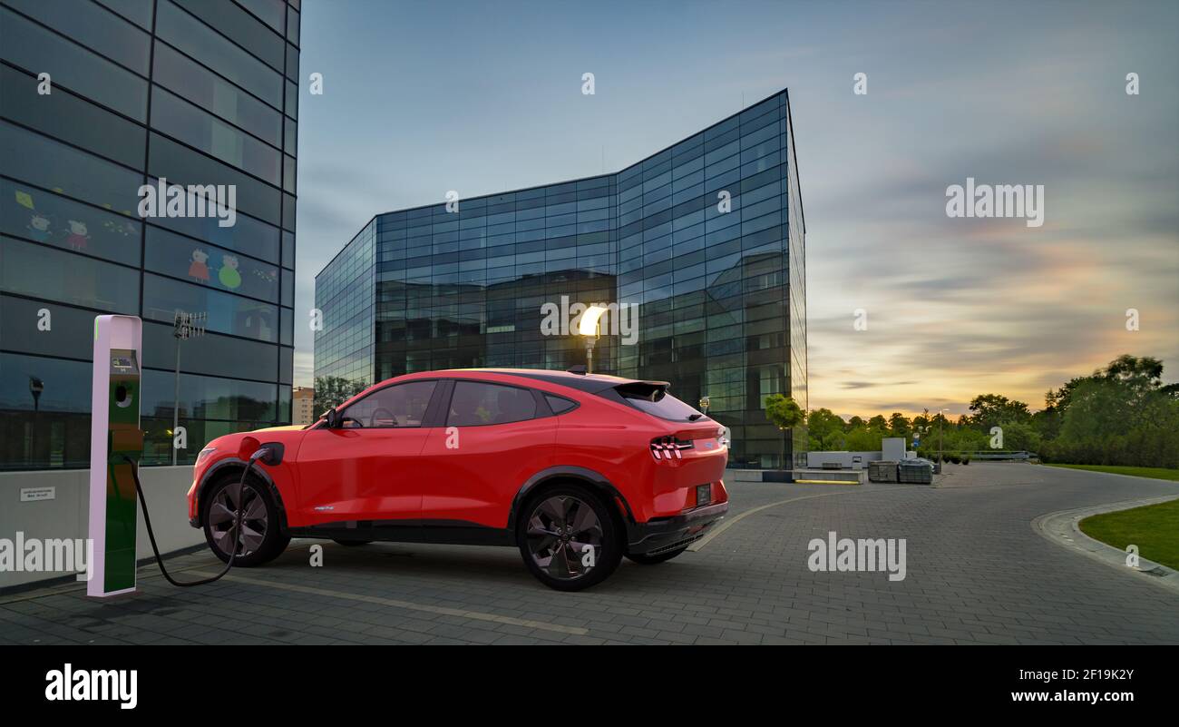 Ford Mustang Mach-E, All-Electric SUV on the charging station Stock ...