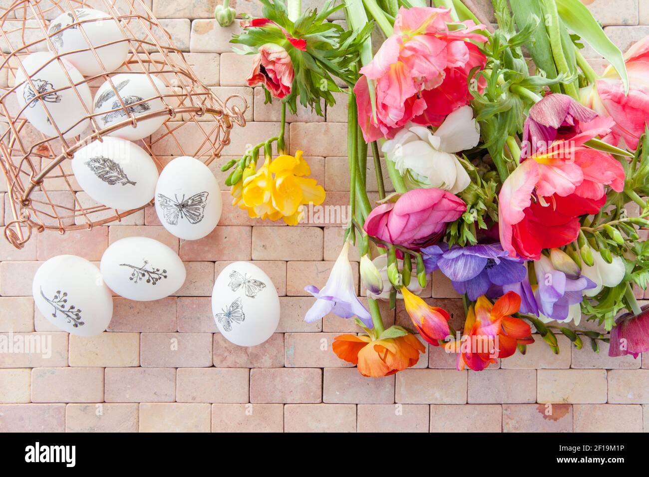 Colorful spring flowers on stone Stock Photo - Alamy