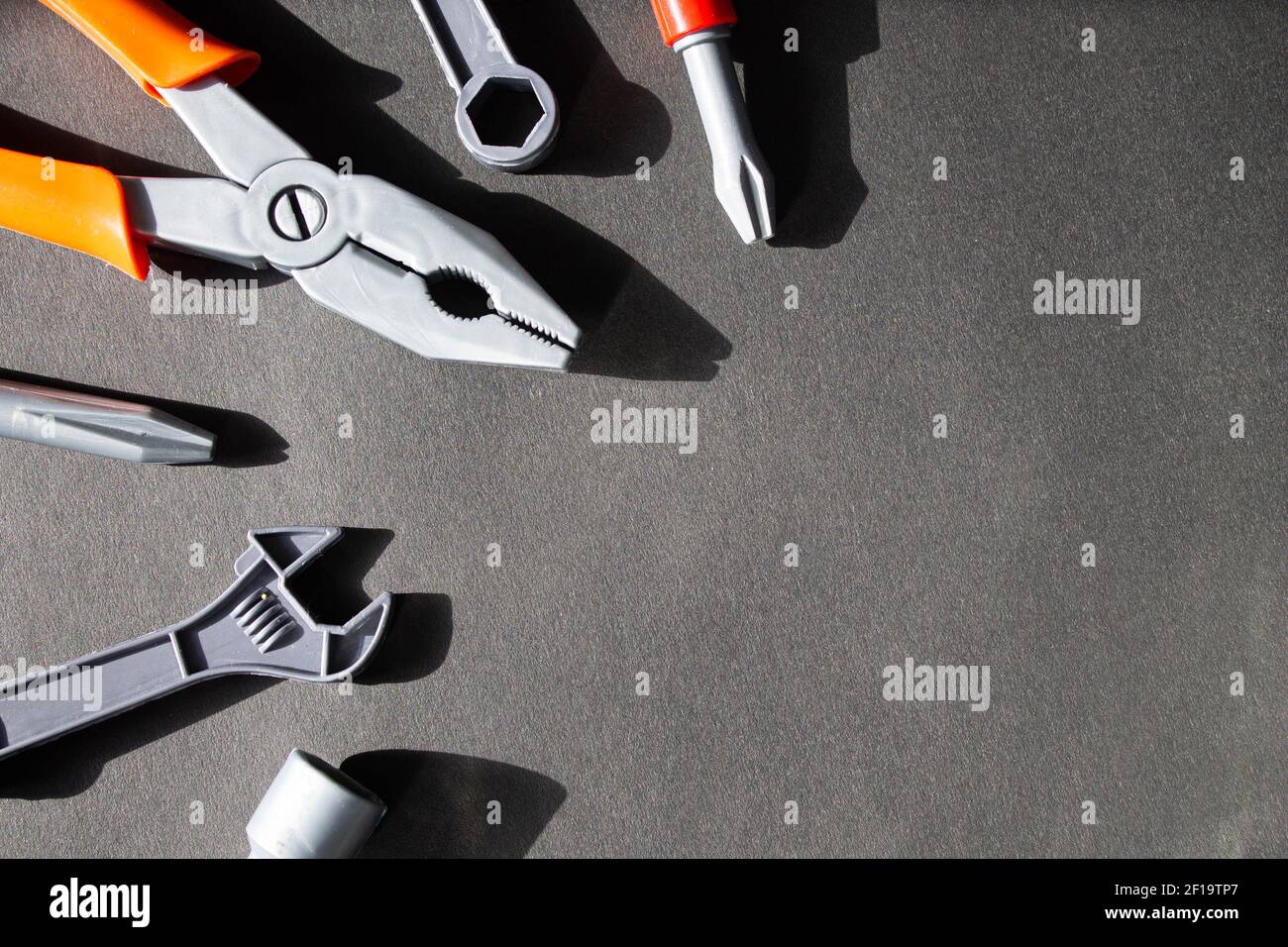 Set of children's plastic tools on an isolated background. Building ...