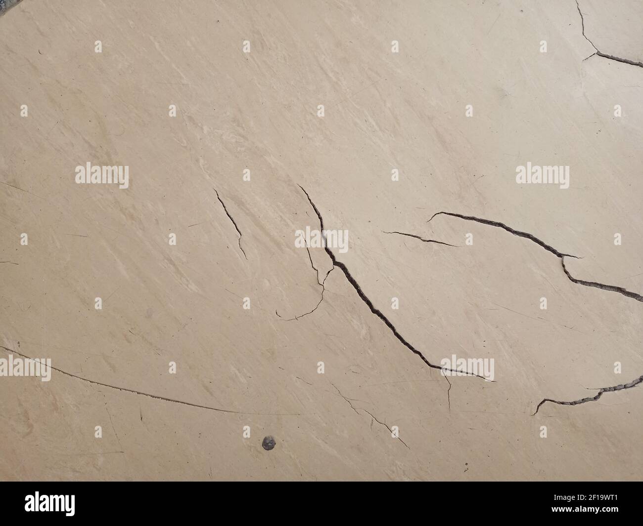 Broken wall texture with old paint. The consequences of the earthquake ...