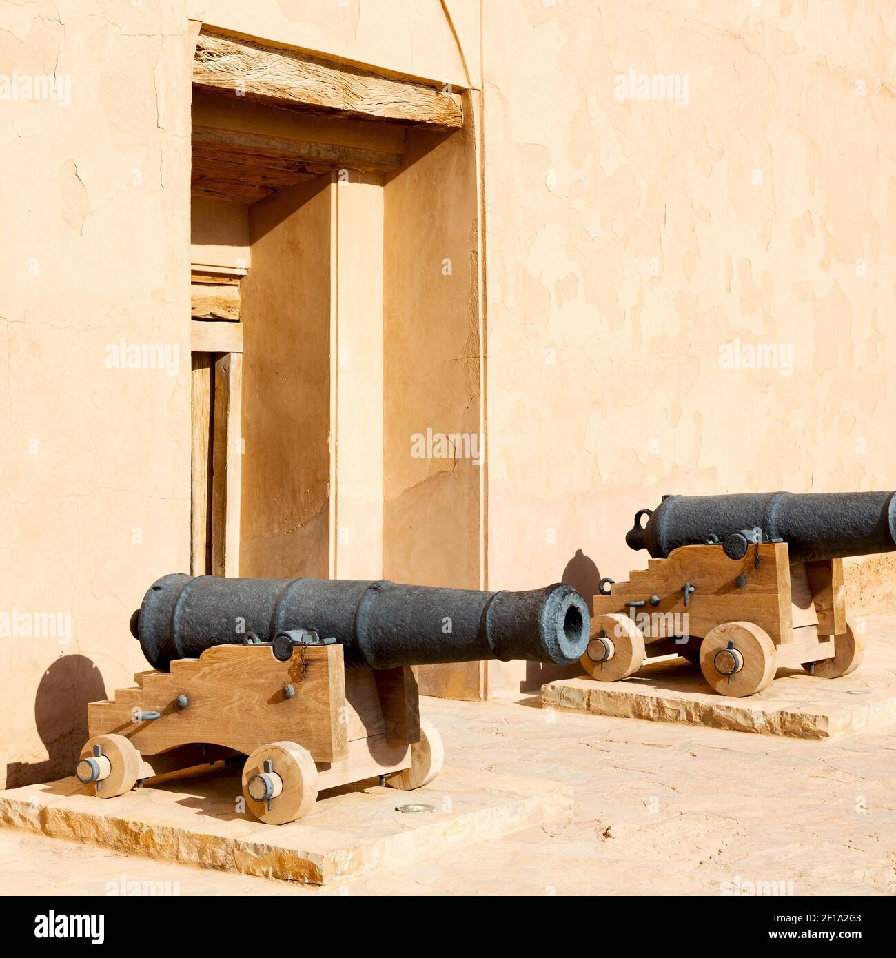 In oman muscat the old castle and cannon near the wall Stock Photo - Alamy