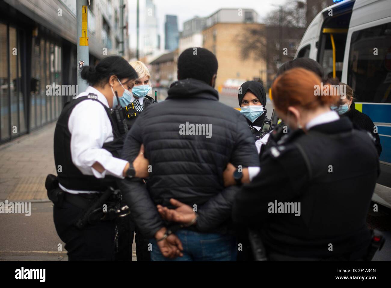 Female police officers and special constables make an arrest following ...