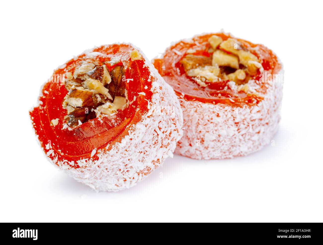 Orange Turkish delight with nuts in powdered sugar isolated on white ...