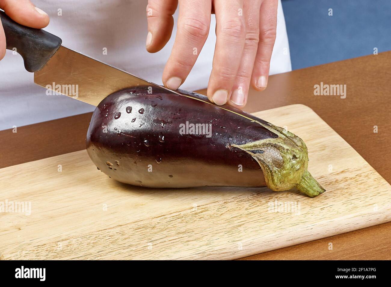 Male hands cook cutting fresh hi-res stock photography and images - Alamy