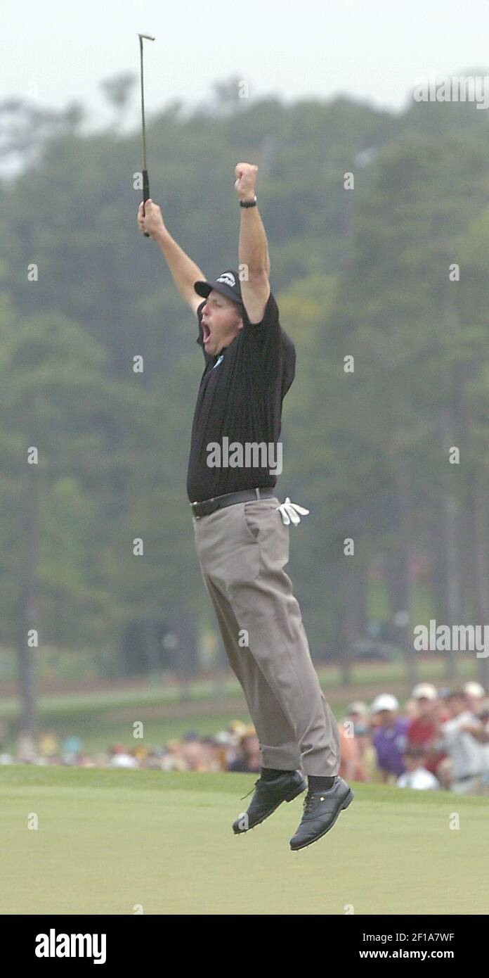 Phil Mickelson celebrates his biride putt on the 18th hole to win the ...