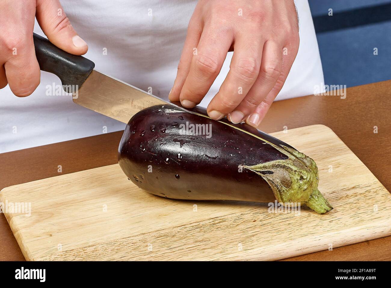 Male hands cook cutting fresh hi-res stock photography and images - Alamy