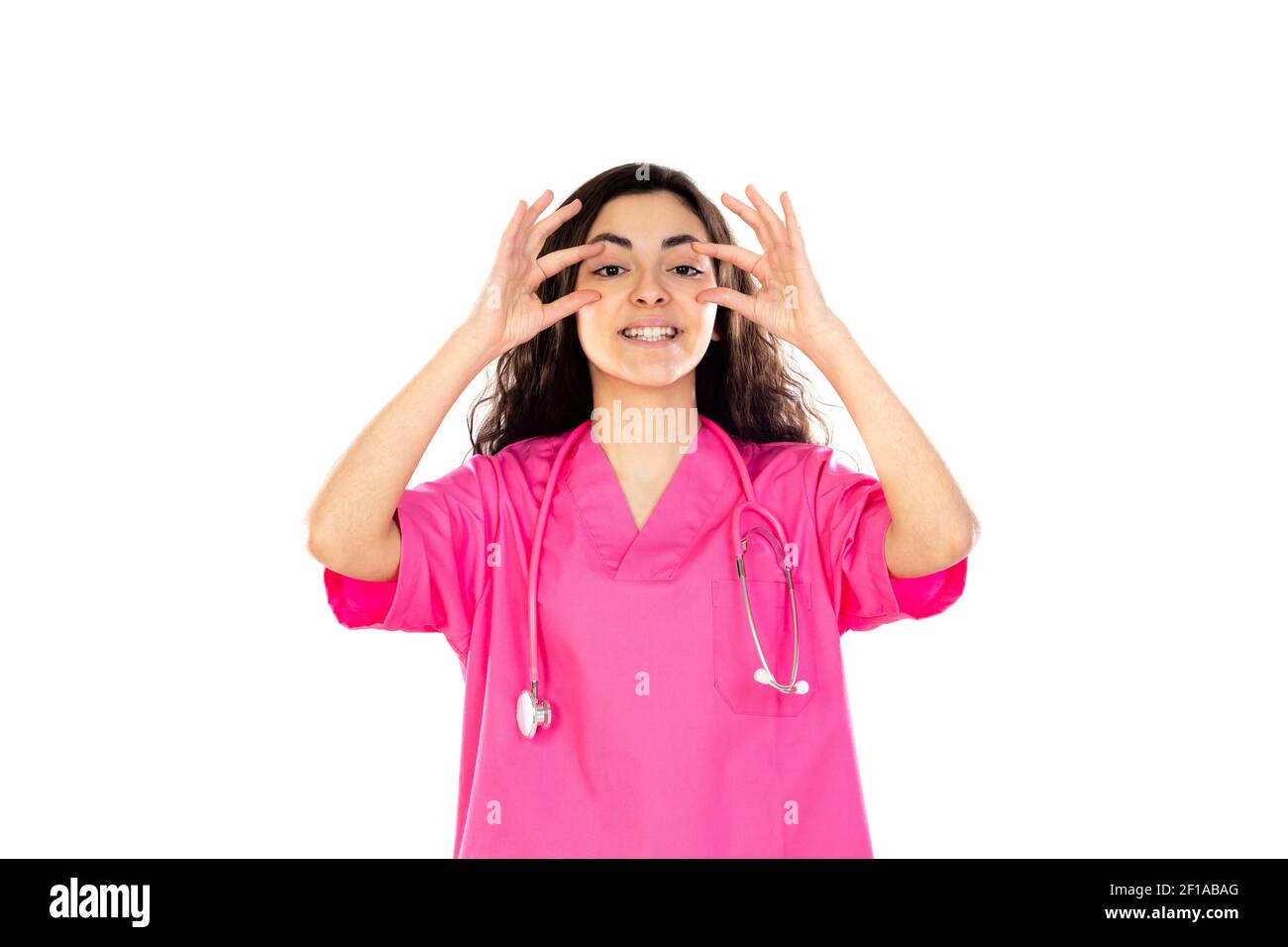 Young doctor with pink uniform isolated on a white background Stock ...