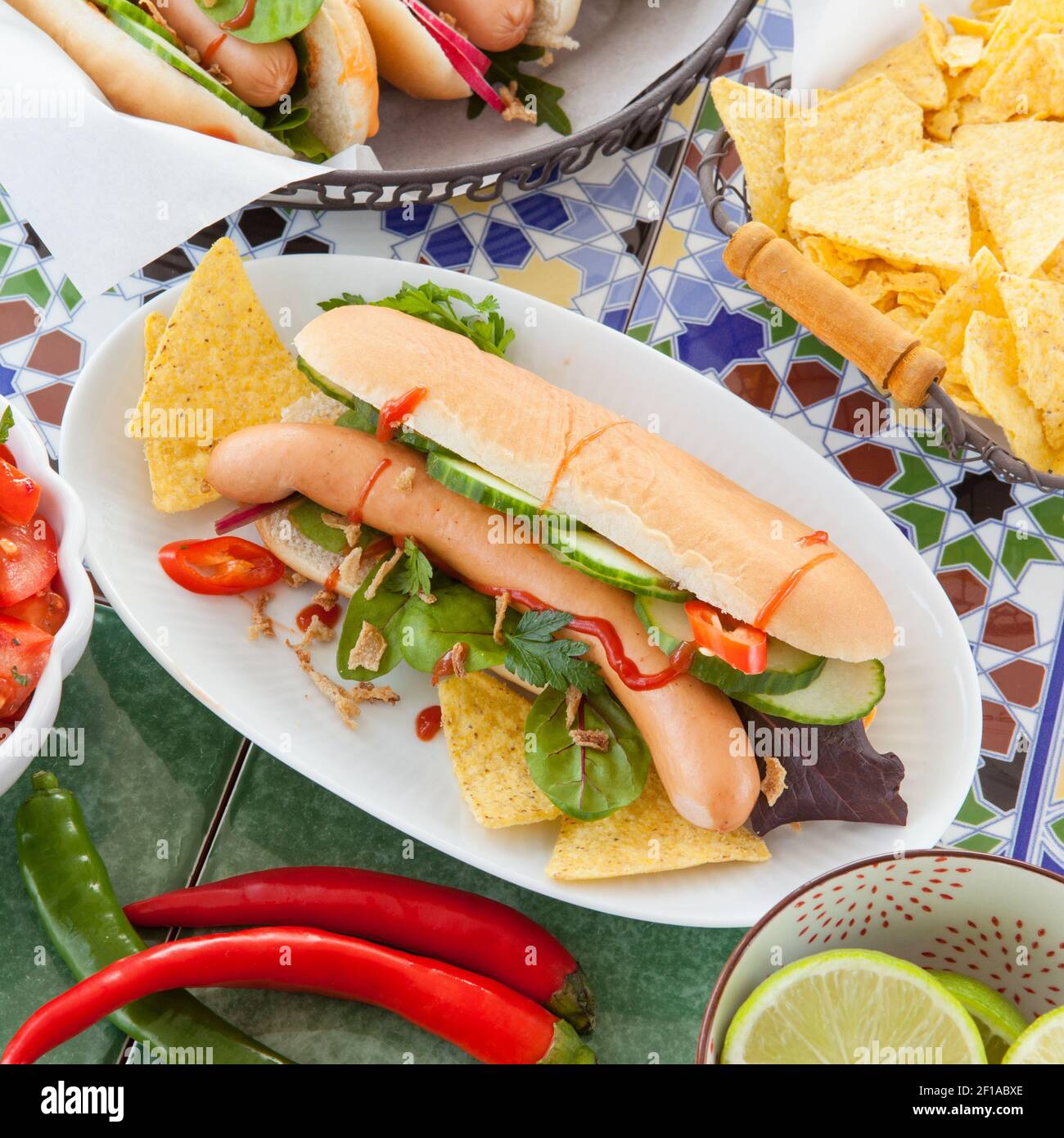 Fresh hot dogs with tortilla chips Stock Photo - Alamy