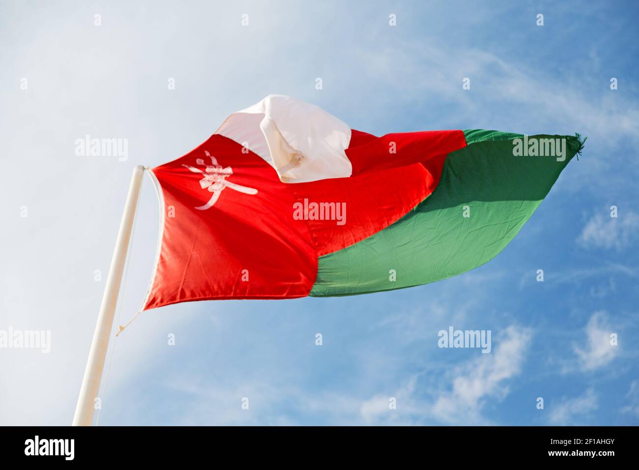 In oman waving flag Stock Photo - Alamy