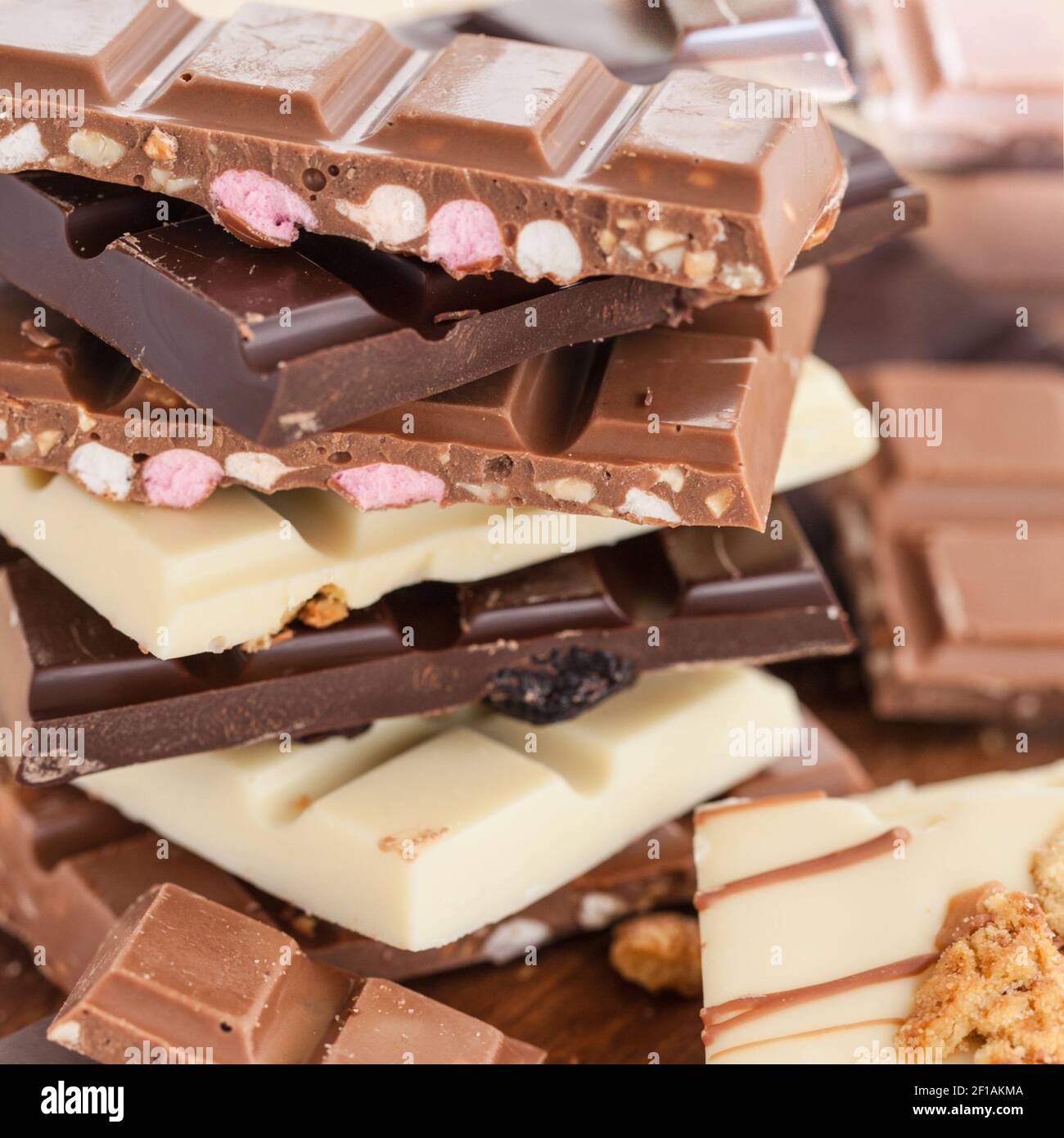 Various chocolate stacked Stock Photo - Alamy