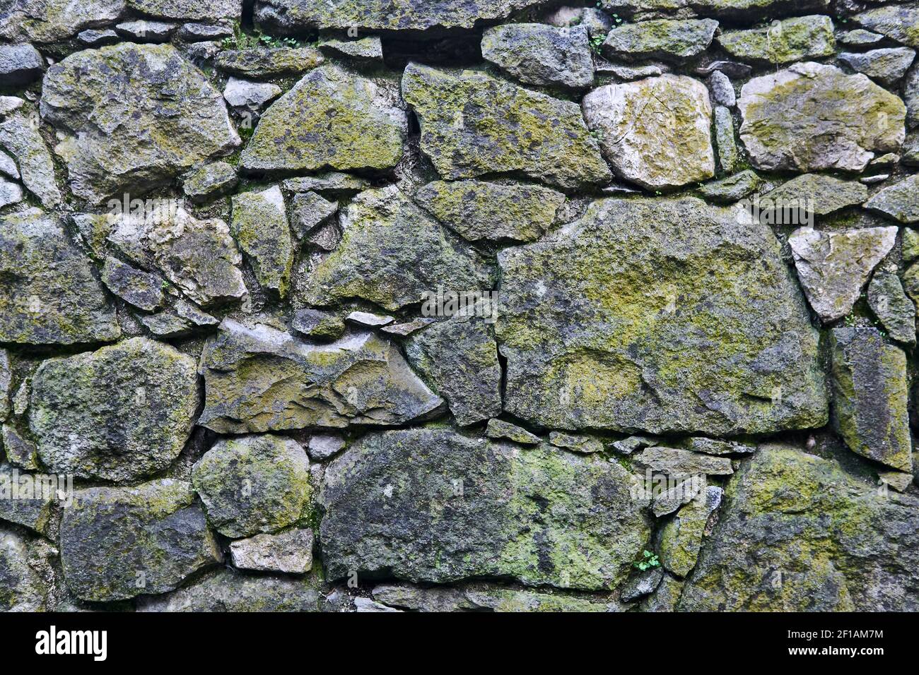 background, texture - ancient masonry at the basement of the castle ...