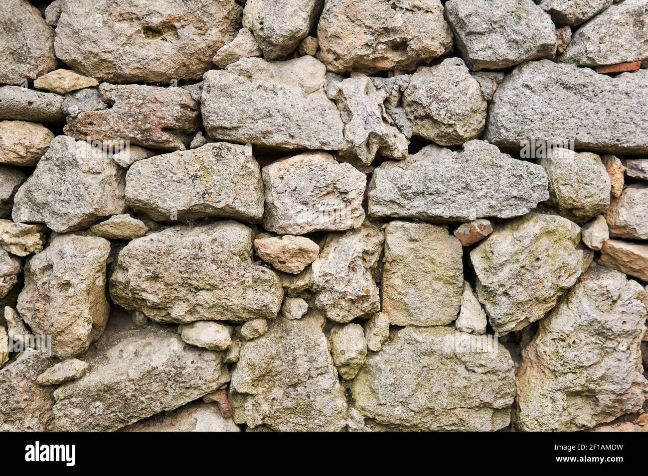 background, texture - ancient dry stone masonry (without mortar for ...