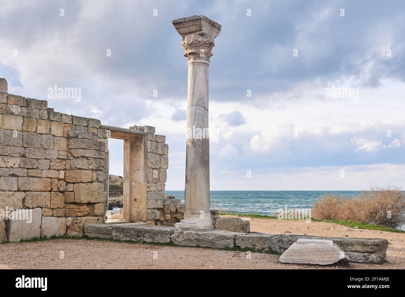 ruins of an ancient Greek temple with column by the sea shore Stock ...