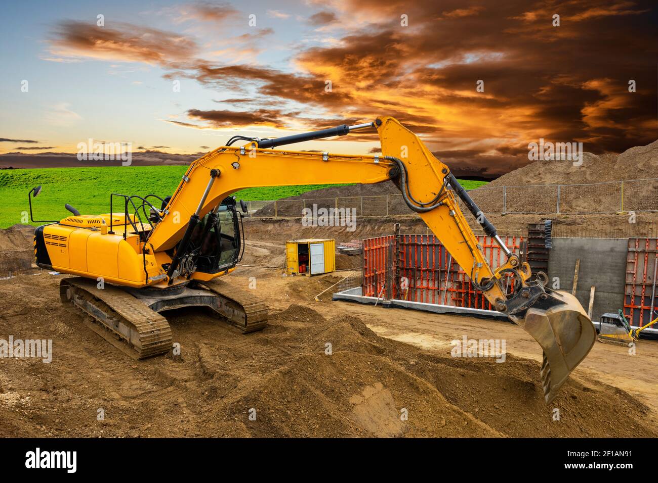 excavator at work on construction site Stock Photo - Alamy
