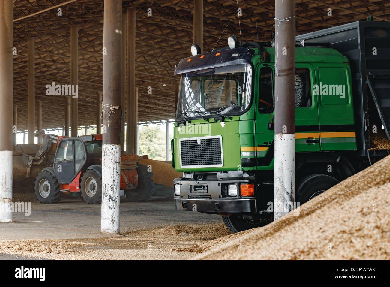 Truck and tractor on a farm parking Stock Photo - Alamy