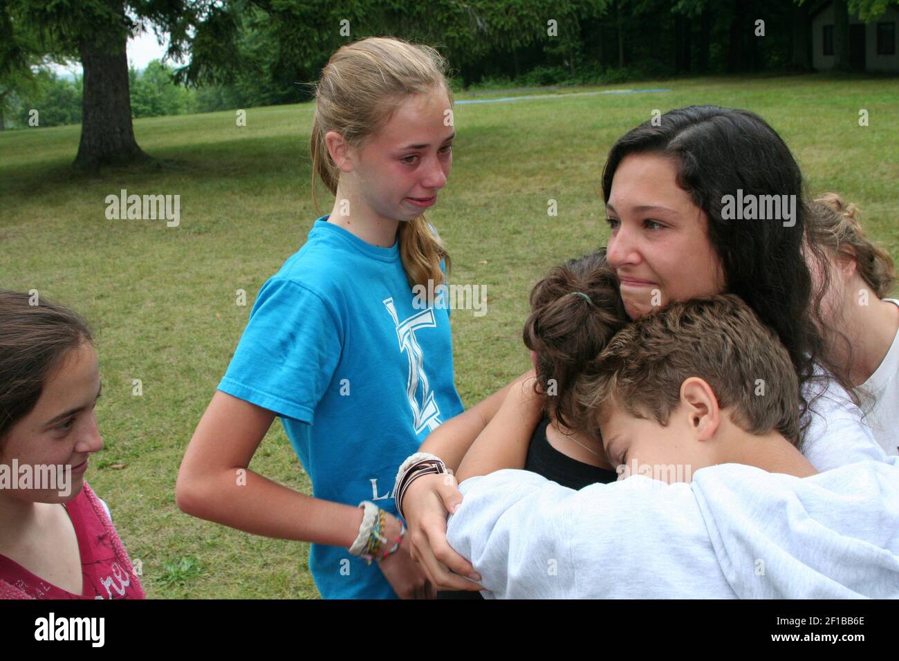 Maud Foriel-Destezet, 16, says goodbye to fellow campers as she ...