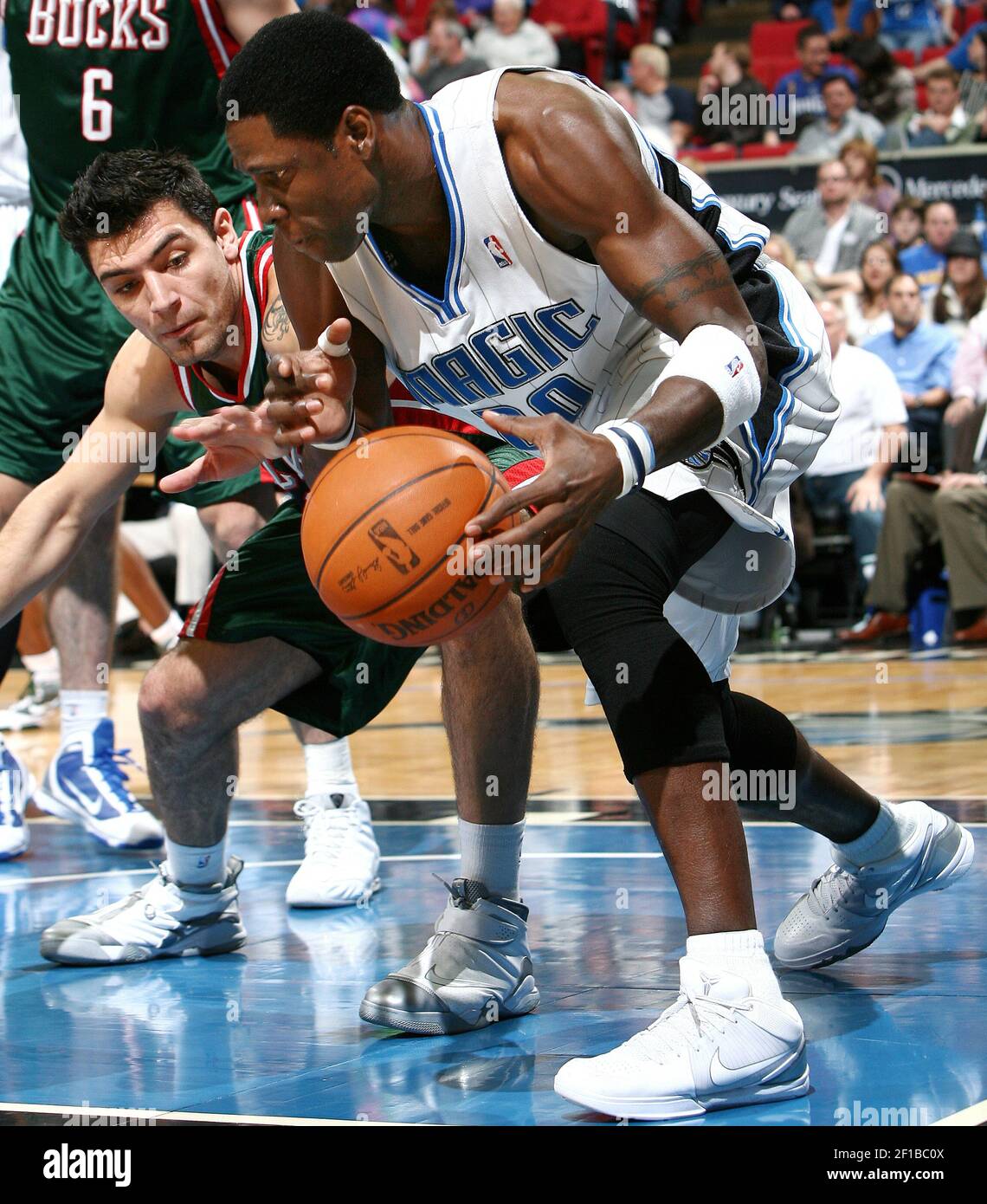 Orlando Magic guard Mickael Pietrus and the Milwaukee Bucks' Carlos ...