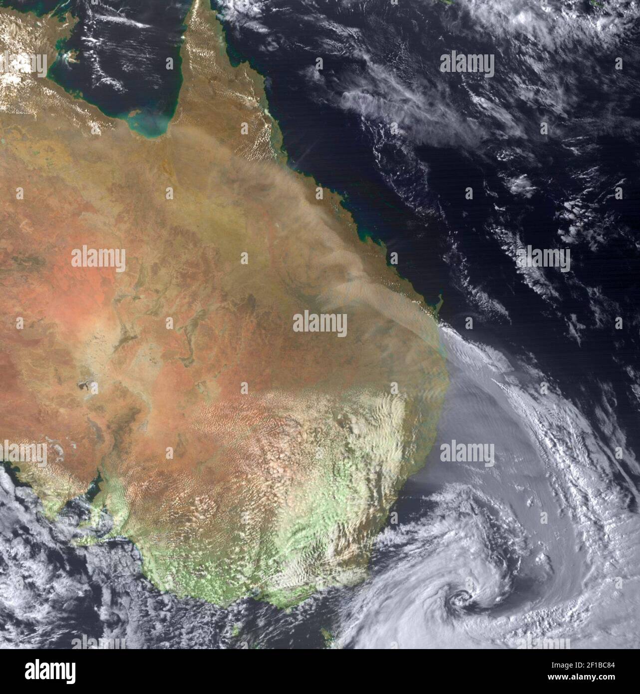 Choking red dust blown from the arid interior of Australia blankets ...
