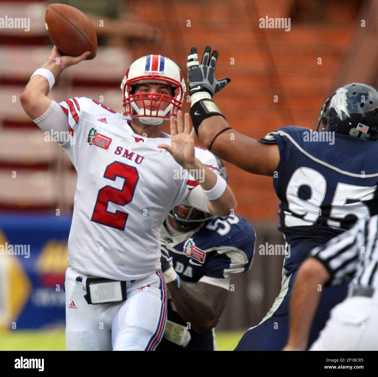 Southern Methodist quarterback Kyle Padron fires a pass against Nevada ...
