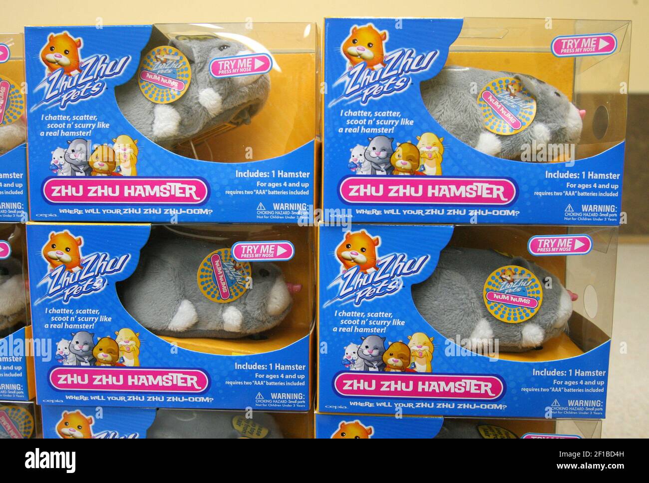 Zhu Zhu toys, the popular $10 robotic hamsters, line the shelf at the ...