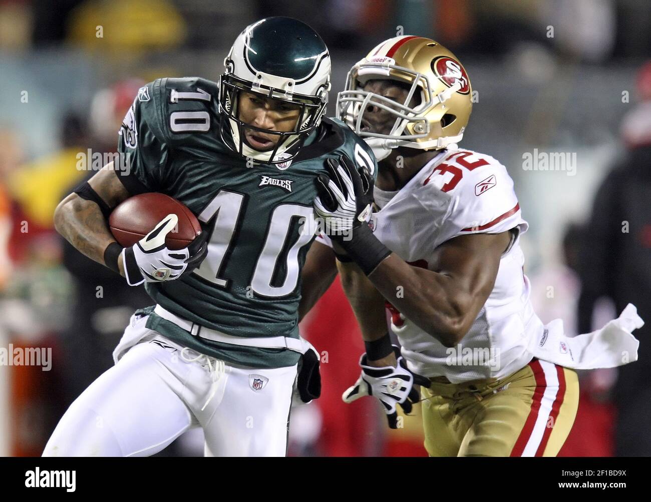 San Francisco 49ers' Michael Lewis pursues Philadelphia Eagles' DeSean ...
