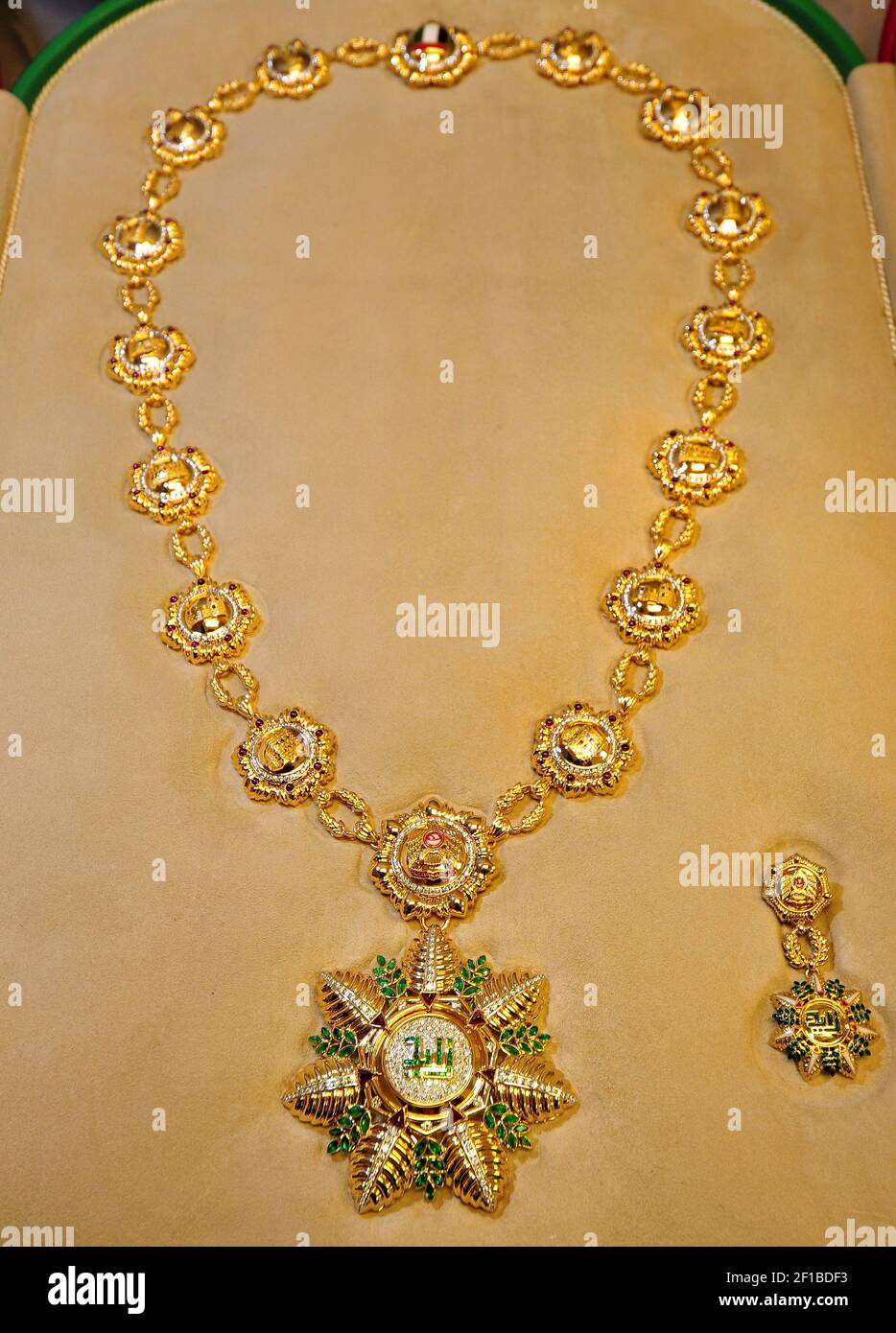 In this photograph, the Order of Zayed gold collar with emeralds ...