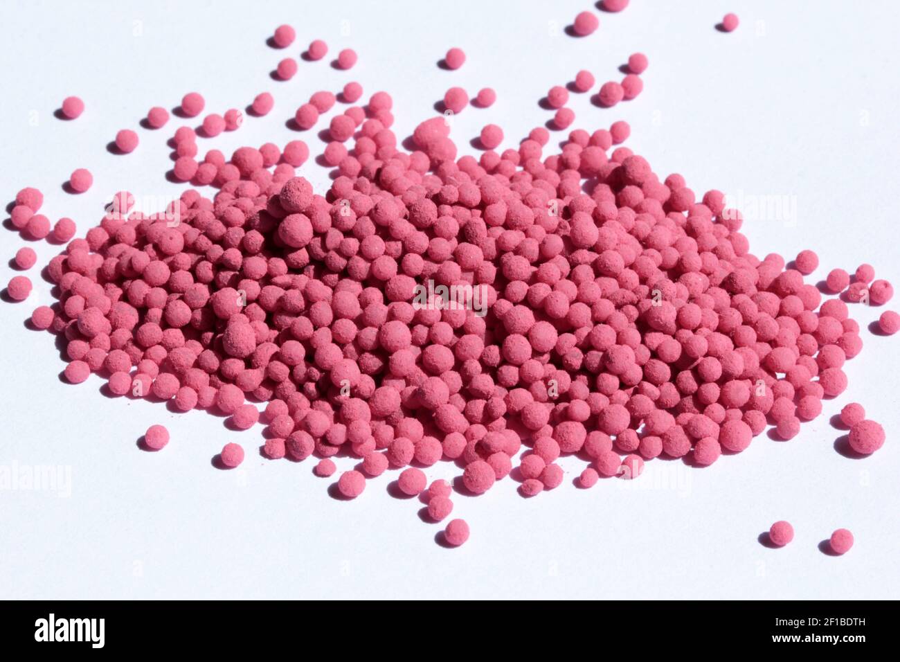 powder food colors on a white background Stock Photo - Alamy