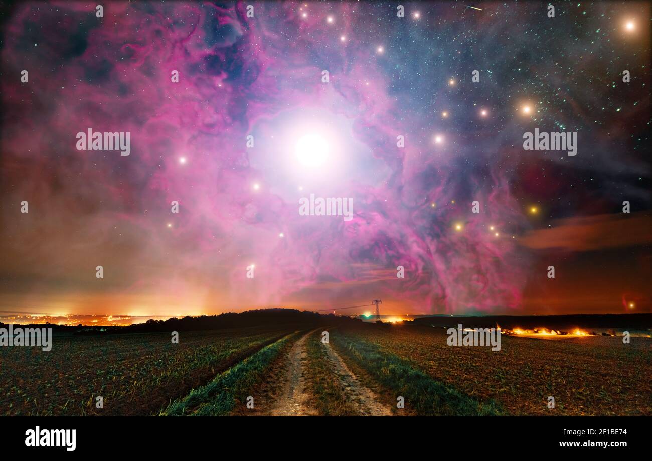 Rural landscape with fantastic space sky Stock Photo - Alamy