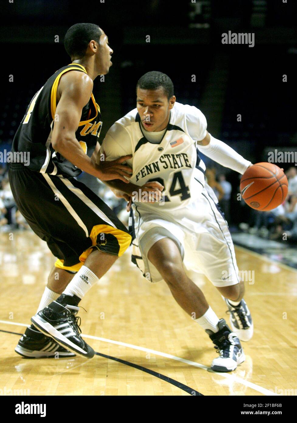 Penn State's Cammeron Woodyard drives around UMBC's Shawn Grant at the ...