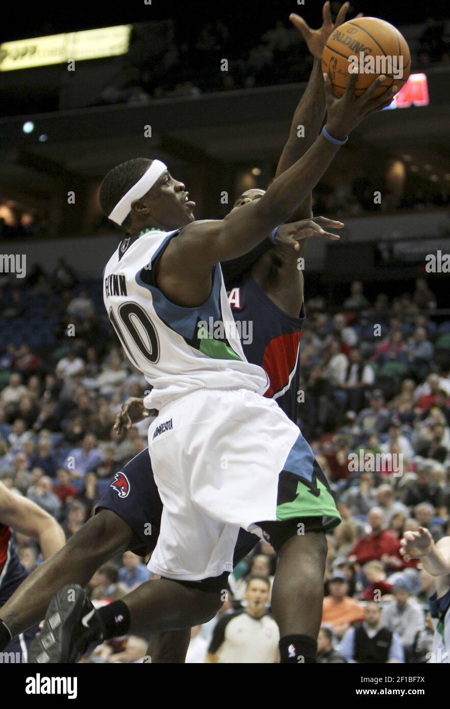 Minnesota Timberwolves Jonny Flynn is fouled by Atlanta Hawks Marvin ...