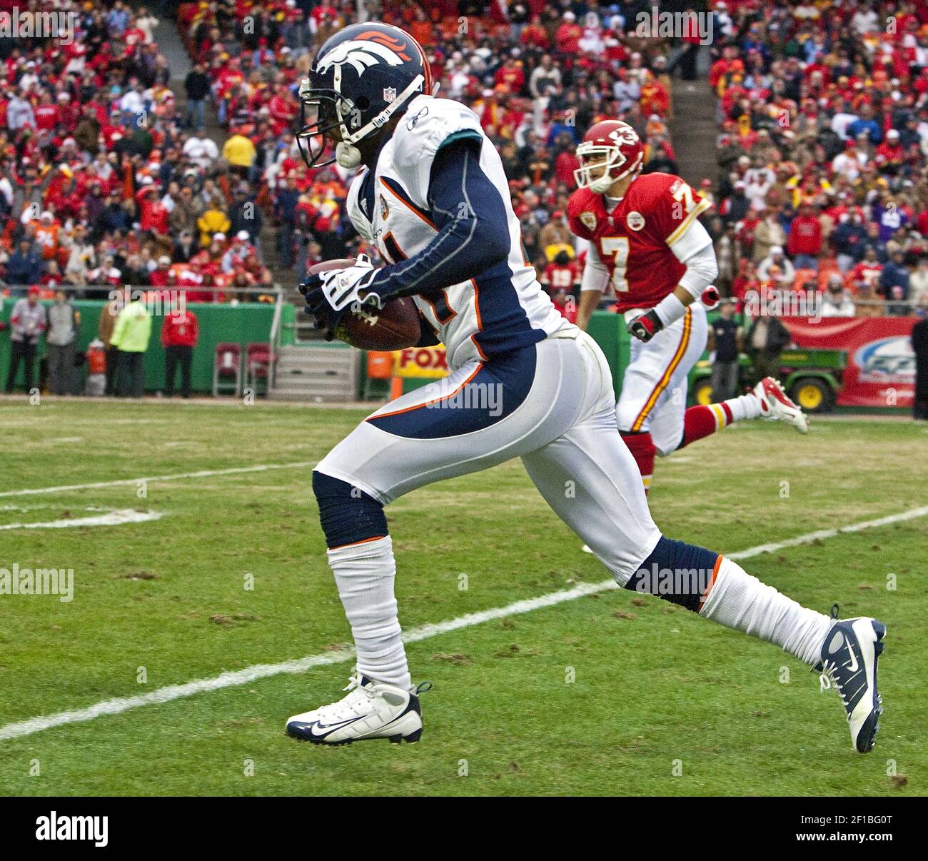 Denver Broncos cornerback Andre' Goodman (21) heads for the end zone ...