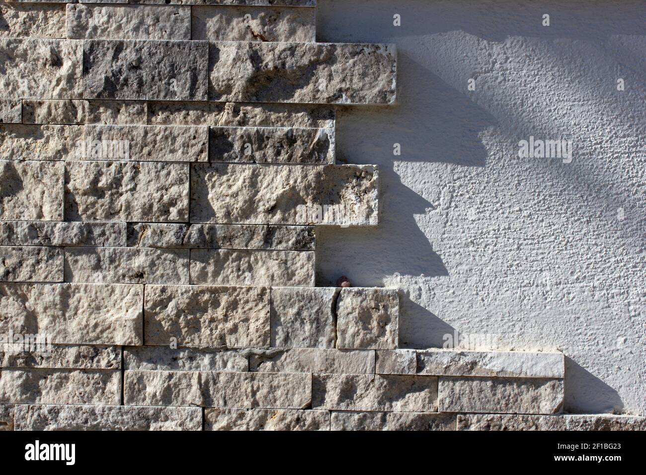 Decorative stone garden wall texture background Stock Photo - Alamy