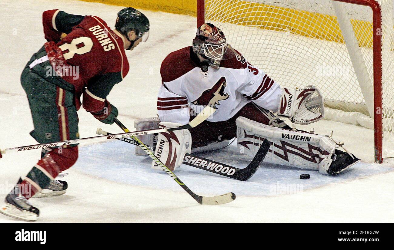 Phoenix Coyotes goalie Ilya Bryzgalov blocks this shot by Minnesota ...