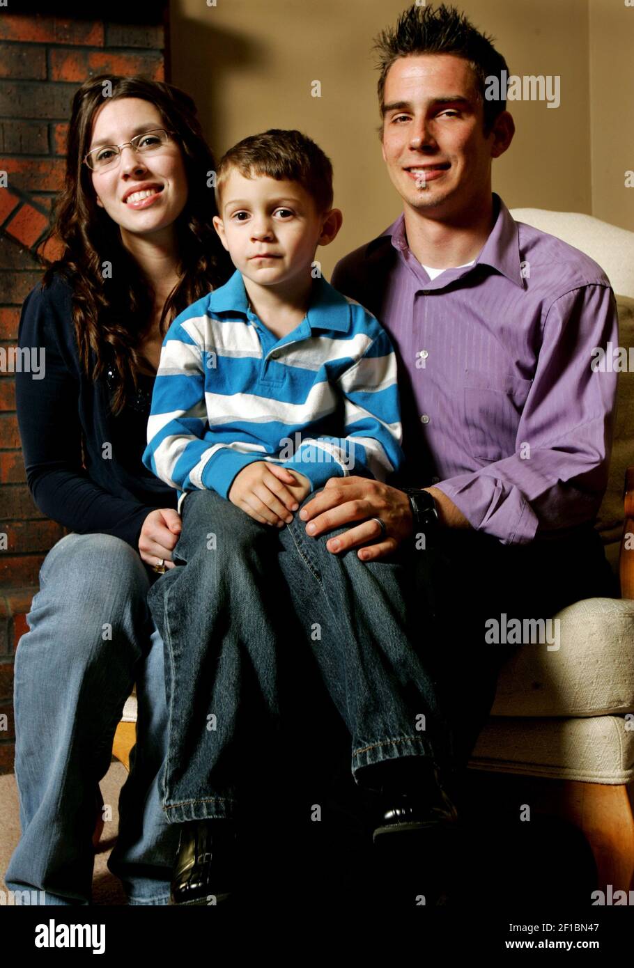 The Ostrander family including Scott, right, Megan and their son Jace ...