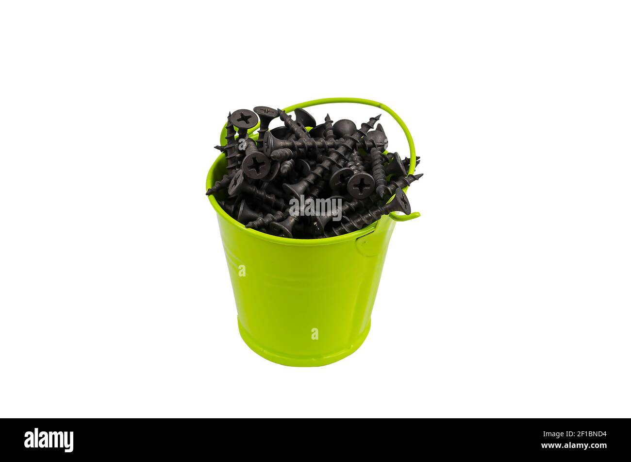 A full bucket of black screws on a white background. Metal fasteners in ...