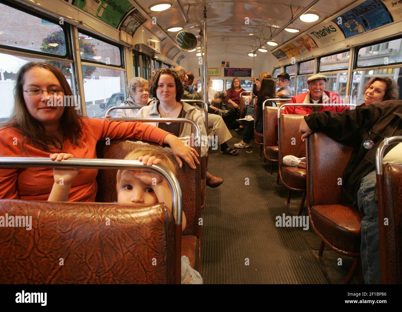 Passengers settle in on a 1944 Pullman bus that's used for a Metro ...