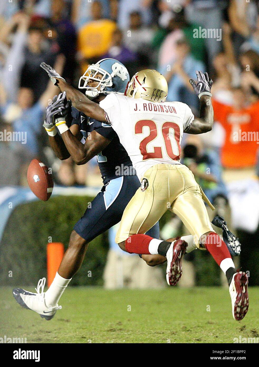 Florida State defender Jamie Robinson (20) breaks up a pass intended ...