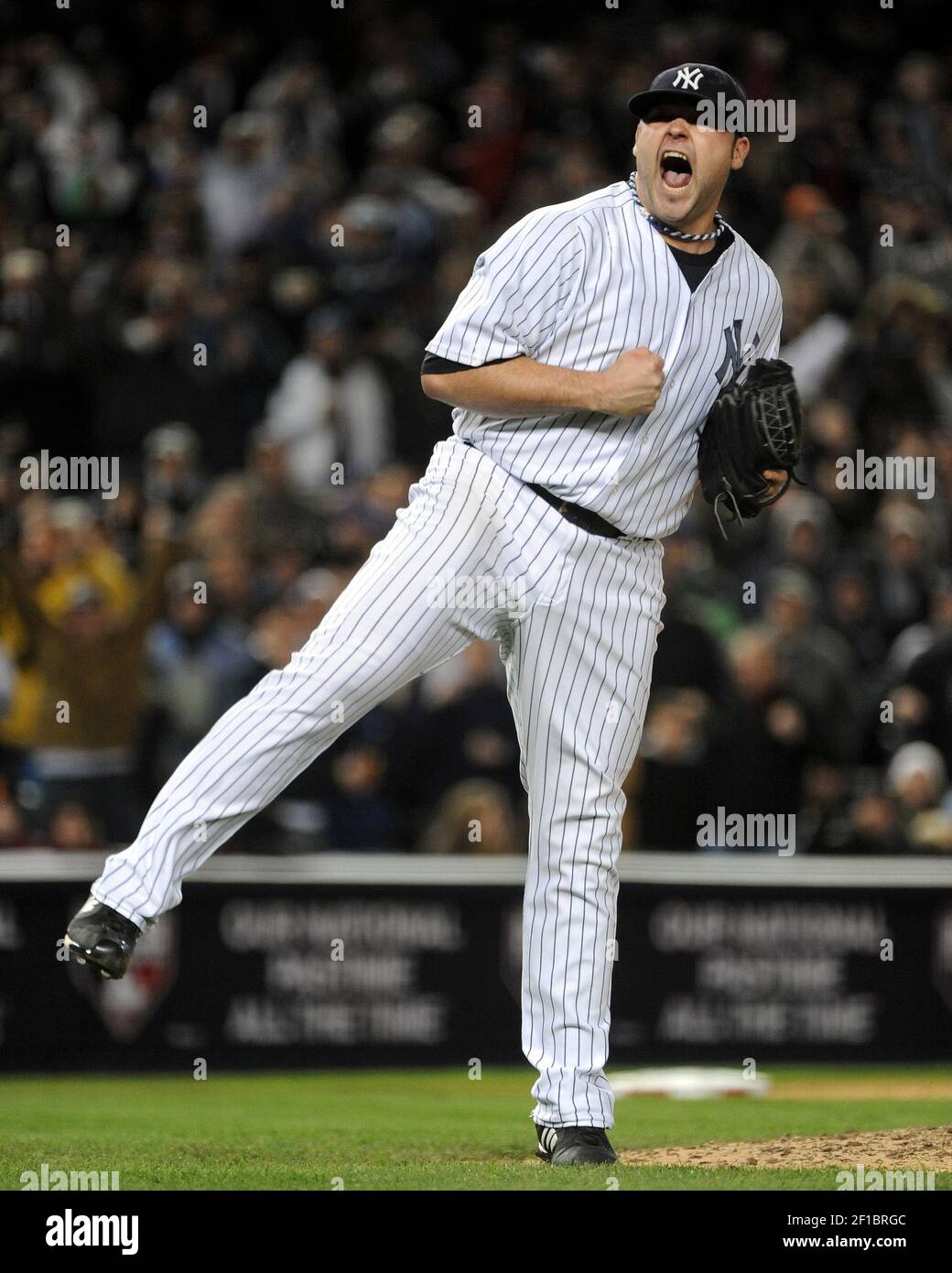 New York Yankees' Joba Chamberlain (62) reacts after striking out Los ...
