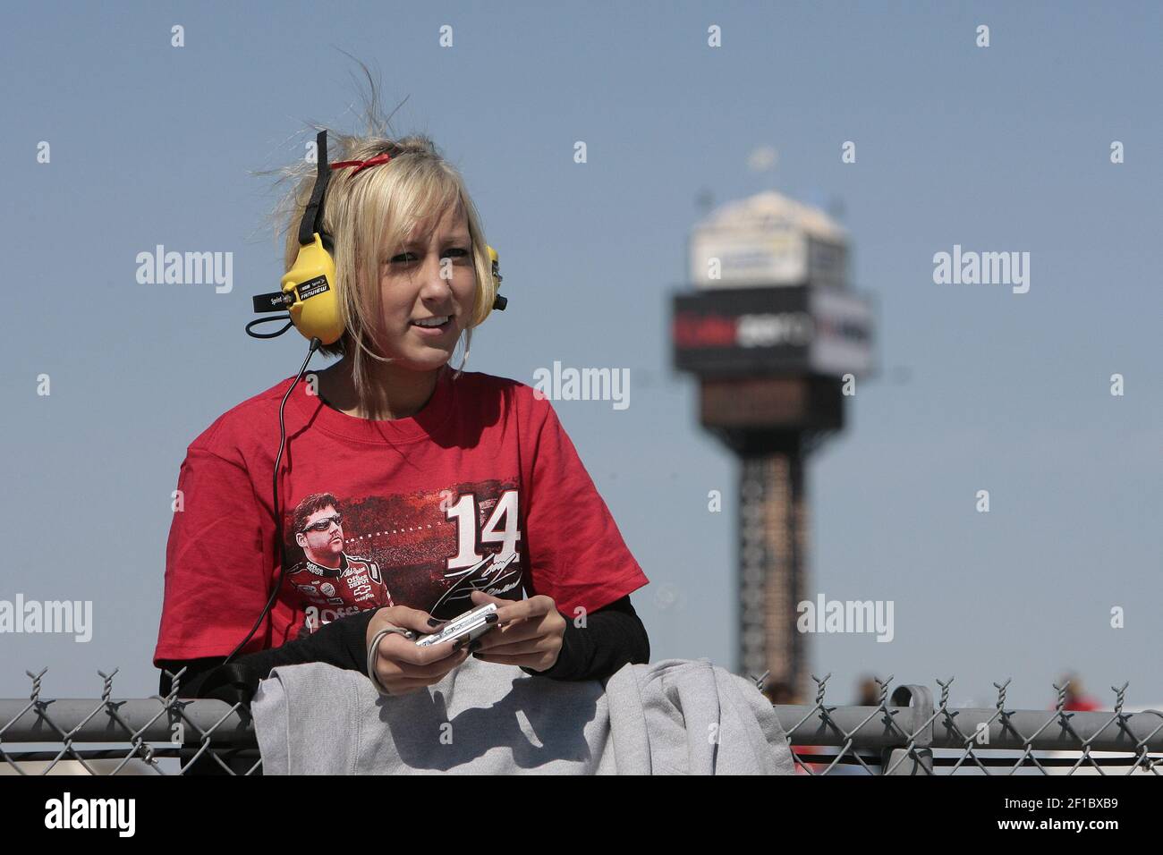 Tony Stewart fan Jenni Hiller of Onawa, Iowa, 17, watches the NASCAR ...