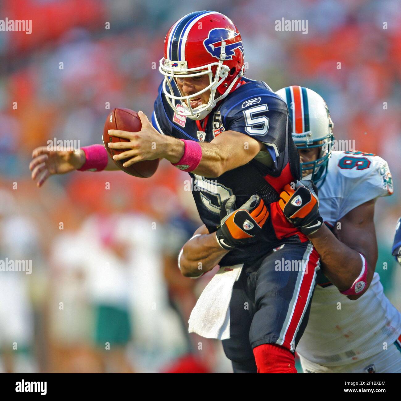 Miami Dolphins' linebacker Jason Taylor sacks Buffalo Bills quarterback ...