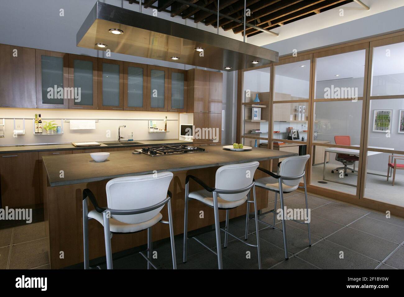 In this photograph, the kitchen and office in the home of Lisa Miller ...