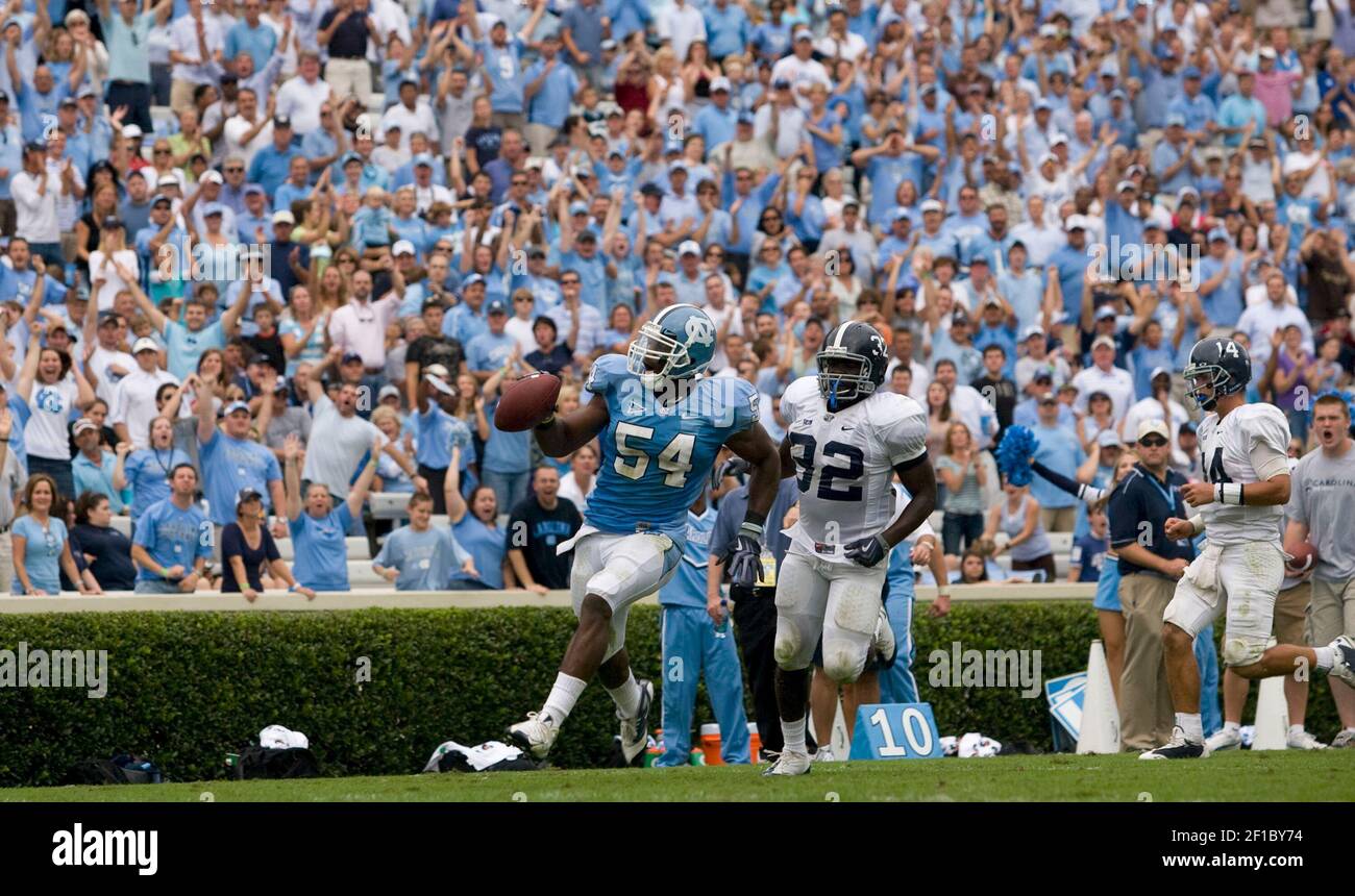 North Carolina's Bruce Carter (54) scores on a 54-yard interception in ...